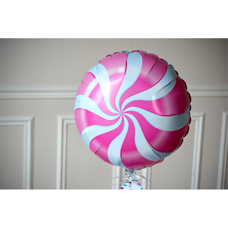 Livraison d'un ballon cadeau candy rose gonflé à l'hélium